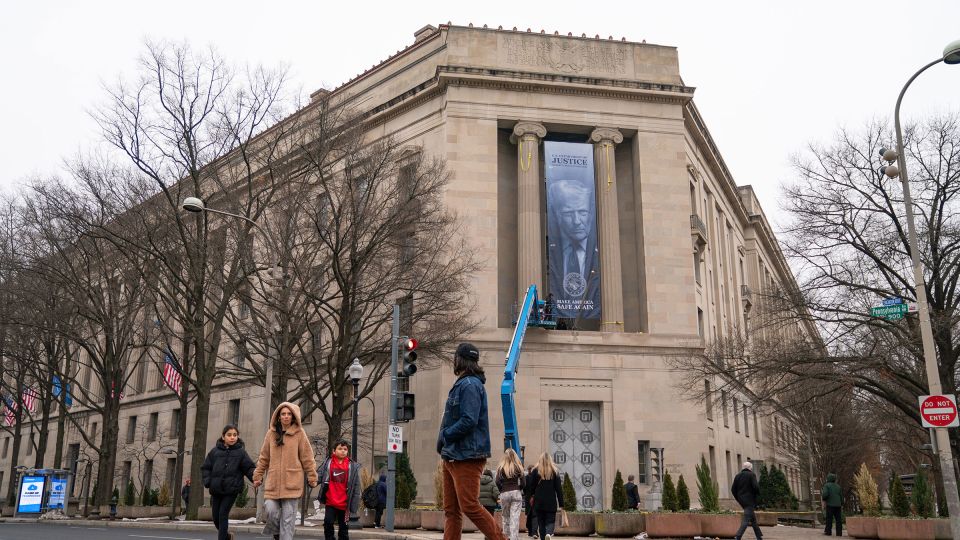 Giant banner of Donald Trump hung at Justice Department headquarters