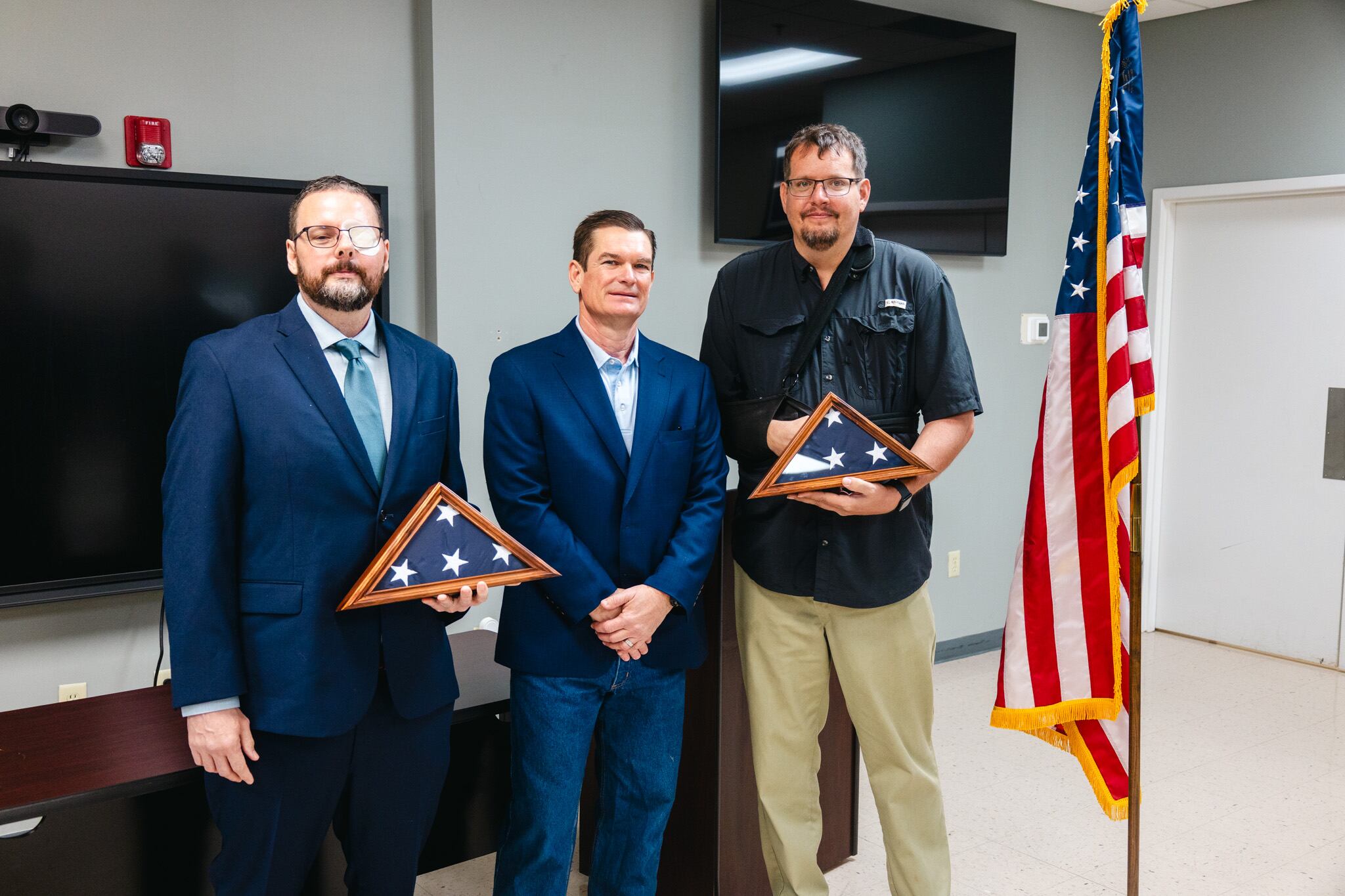 State lawmaker presents flags to Tifton police officers injured in line ...
