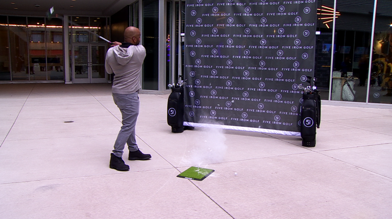 Indoor golf course in downtown Syracuse celebrates opening with ...