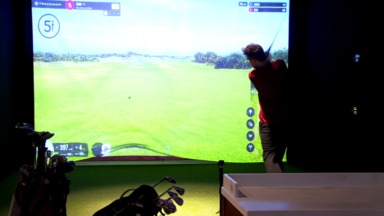 Indoor golf course in downtown Syracuse celebrates opening with ...