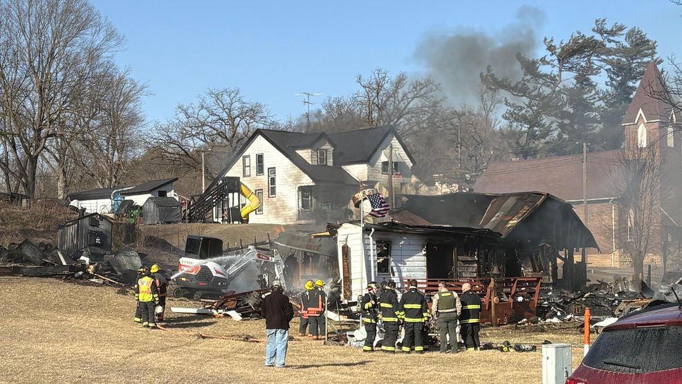 Wind spreads house fire to neighboring Garber home