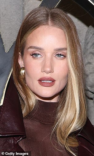 What has she done to her face? Rosie Huntington-Whiteley looks very ...