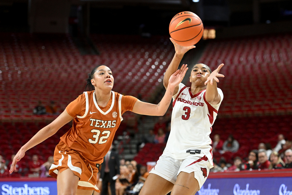 Booker leads five in double figures as No. 4 Texas defeats Arkansas 93-62
