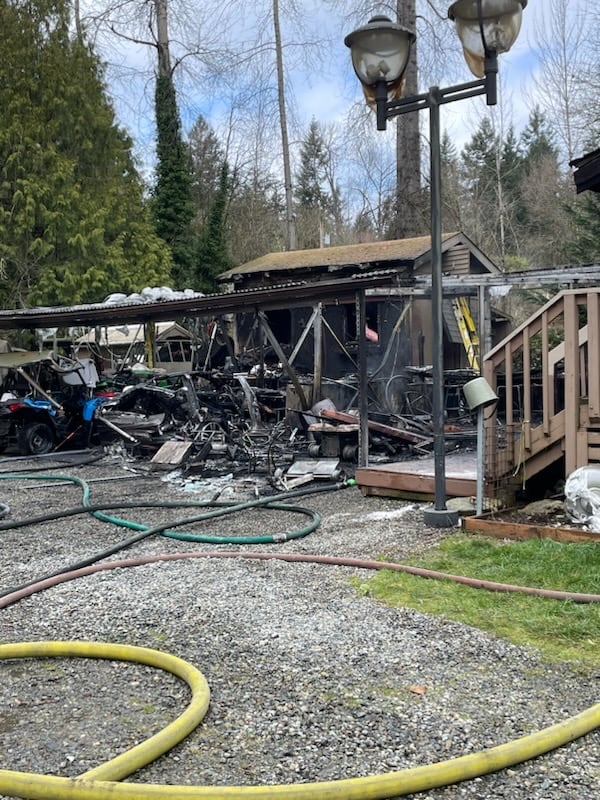 Fire destroys home in Renton after spreading from one building to another