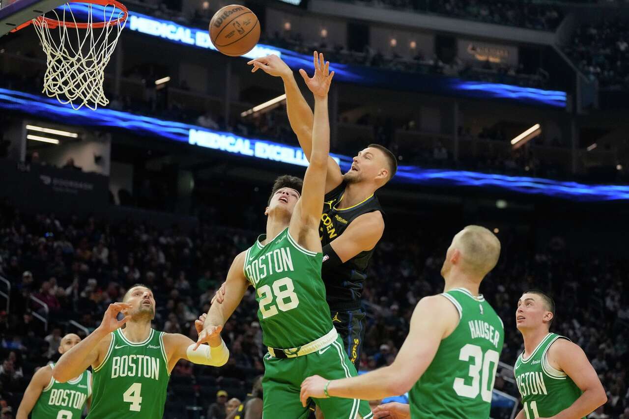 Porzingis solid in Golden State debut, but Curry-less Warriors rolled ...