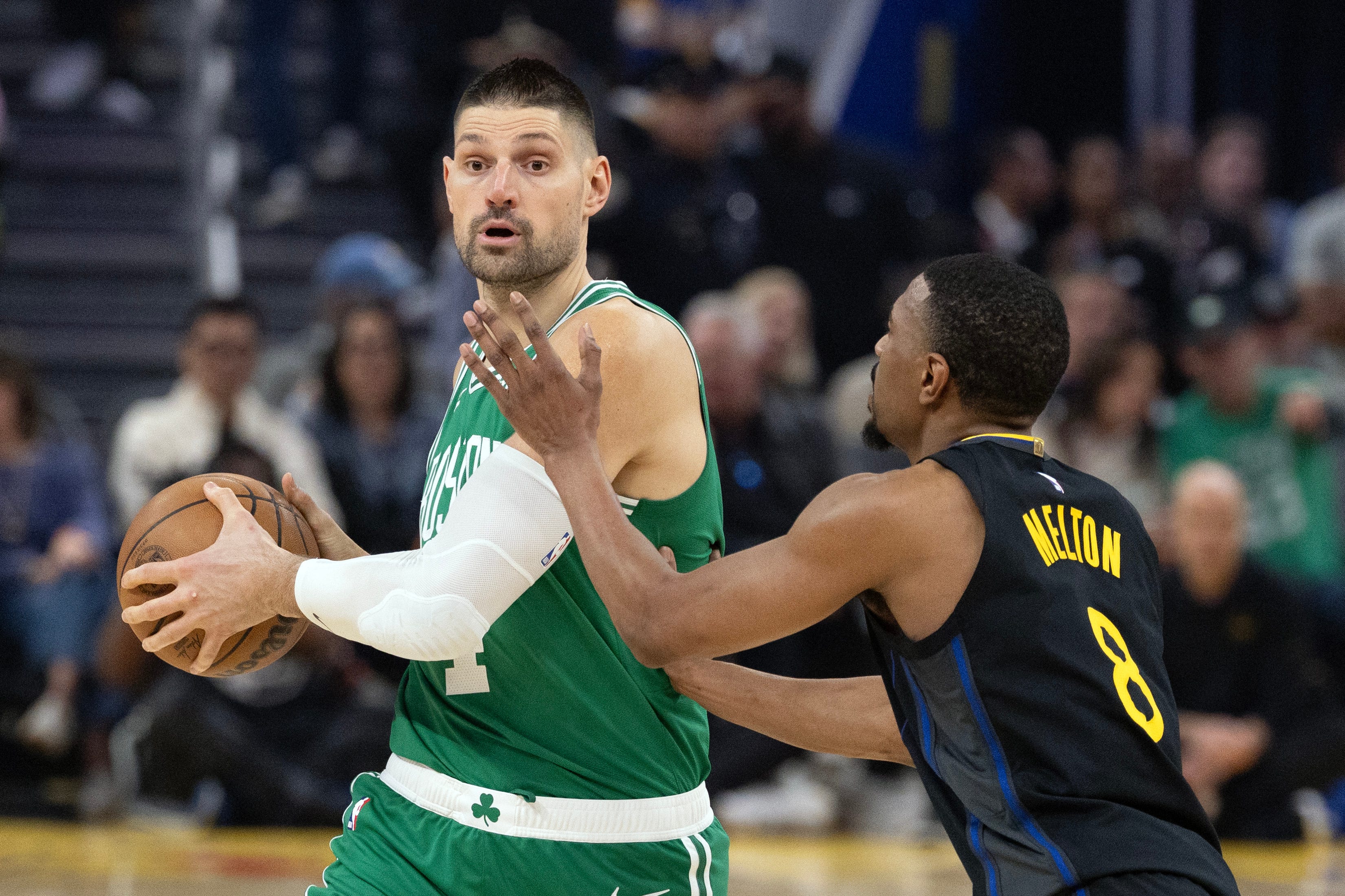 Celtics hold off late rally to down Warriors in first game since ASG