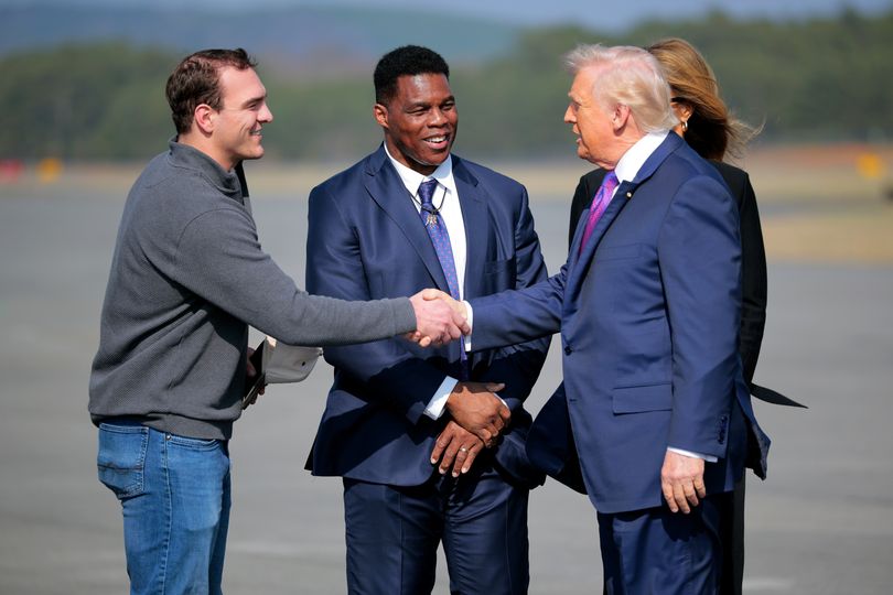 Donald Trump makes things awkward as he heaps praise on 'handsome ...