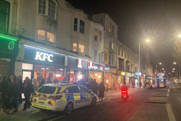 Police called to incident at fast food restaurant involving 'large group'