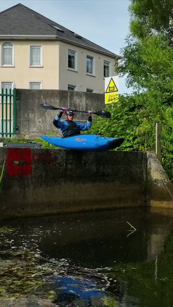 Testing my new freestyle kayak off this wall drop