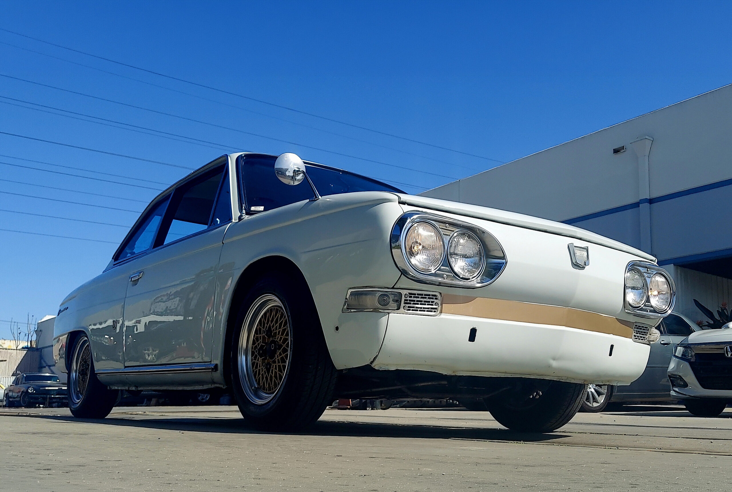 Cosplay early Japanese racing glory with this Hino Contessa 1300S