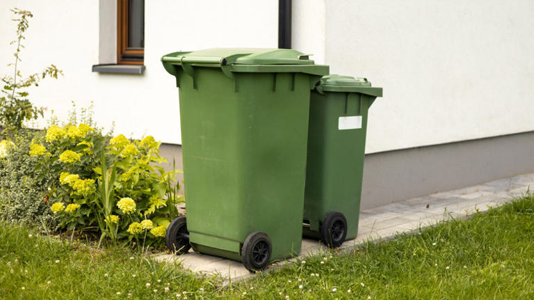 Boost curb appeal with an outdoor trash can storage area DIY solution