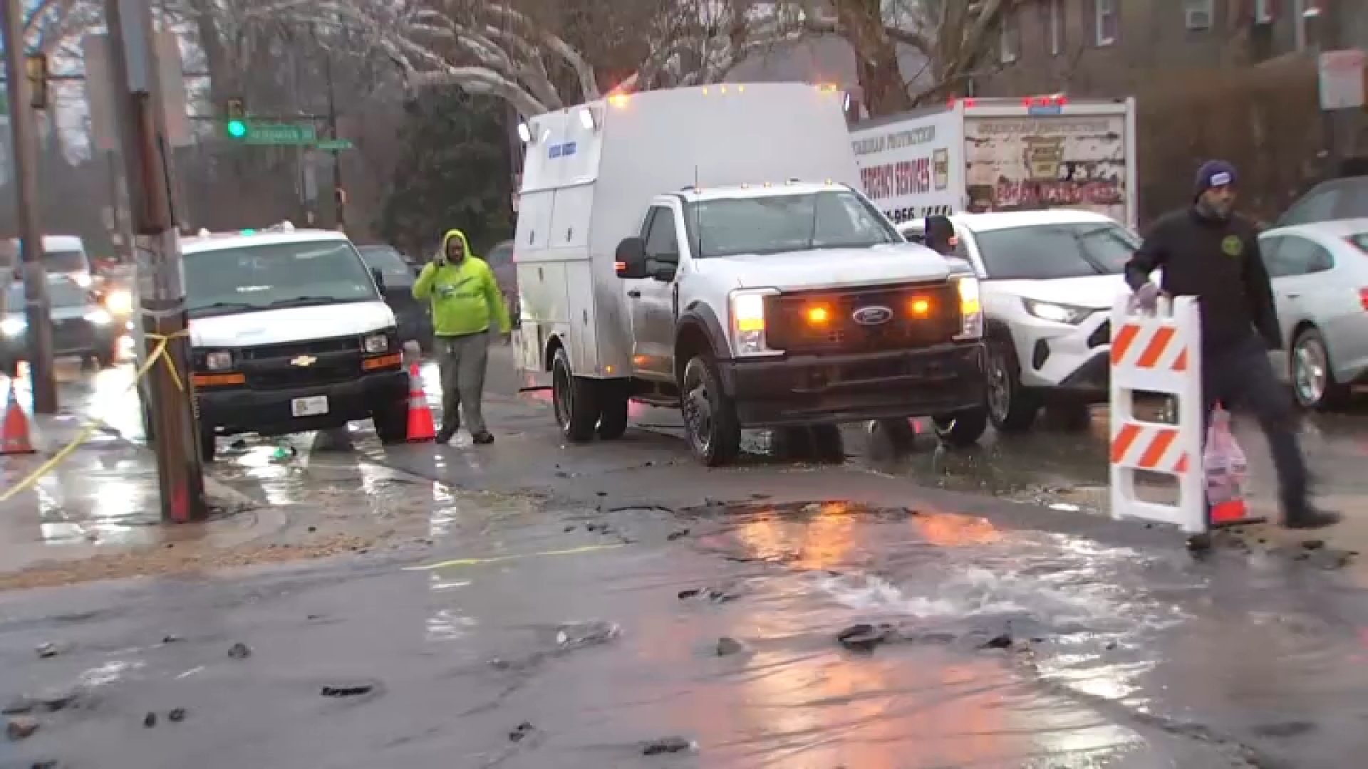 Water main break sends water flowing down street in East Mount Airy
