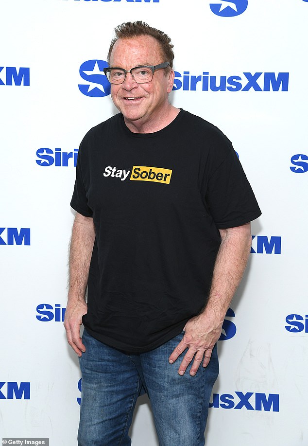 Tom Arnold, 66, seen in wheelchair as he says he 'broke his back ...