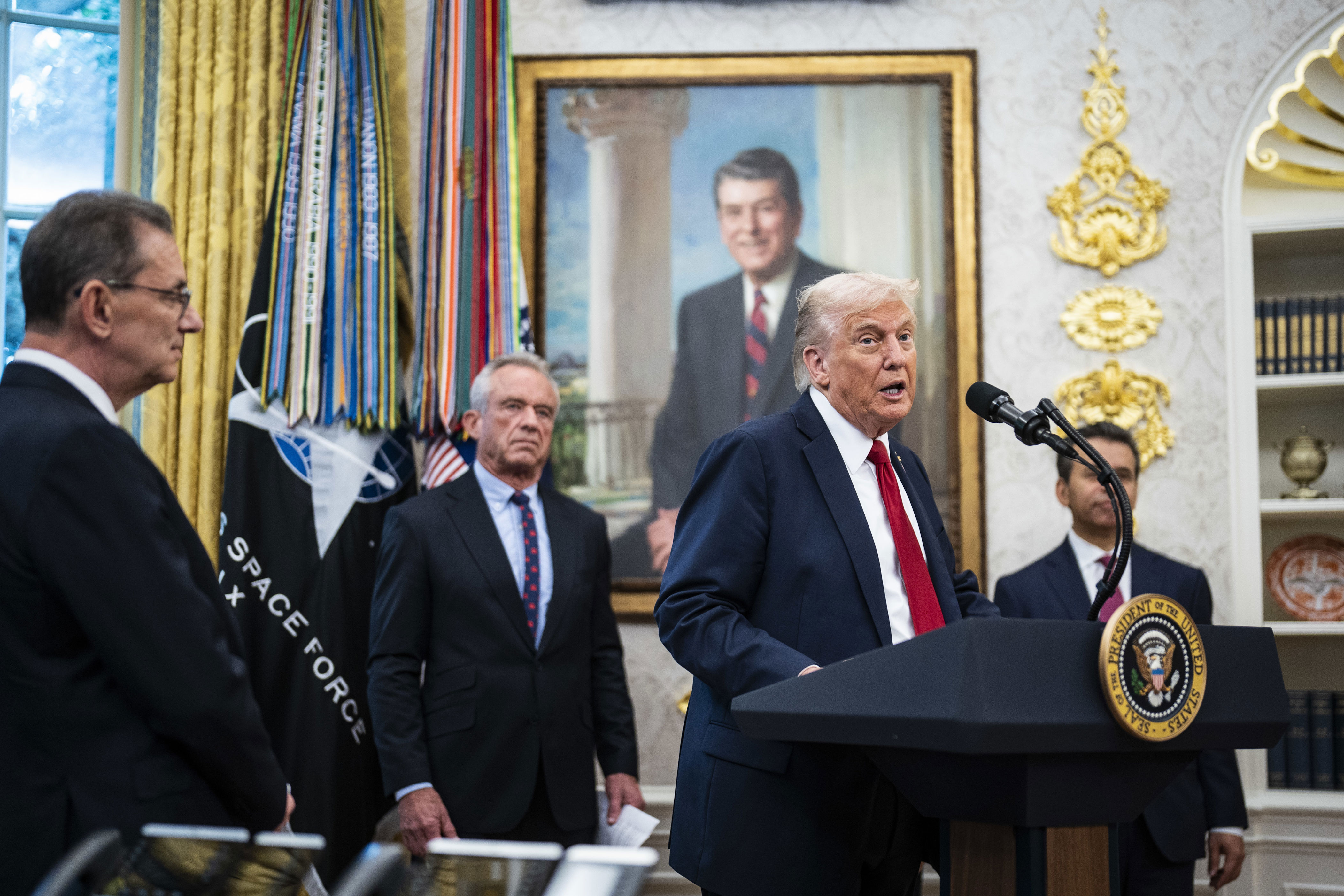 Trump imposes new tariffs, denounces Supreme Court justices as a ...