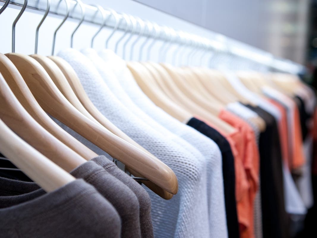 Outlet clothing store celebrating grand opening of warehouse in North ...