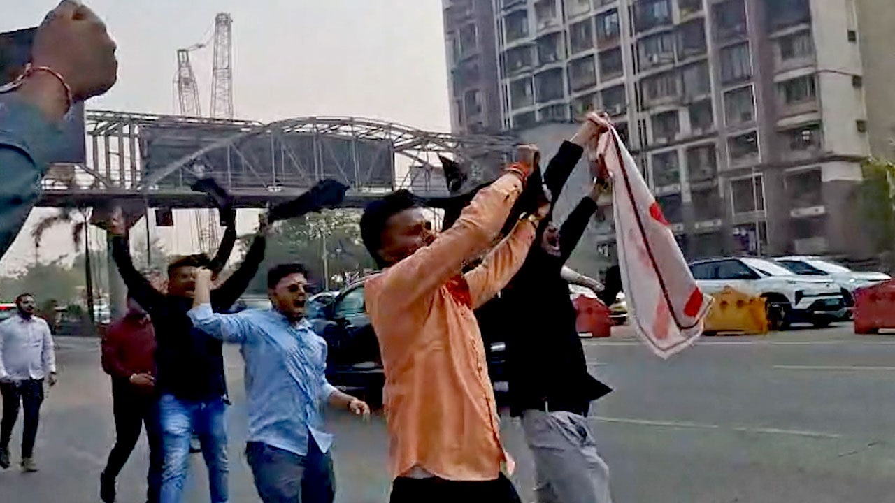BJP workers wave black flags at Rahul Gandhi after Congress' shirtless ...