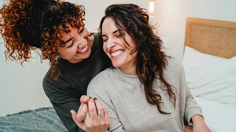 The body language of attraction: How to read if someone is into you
