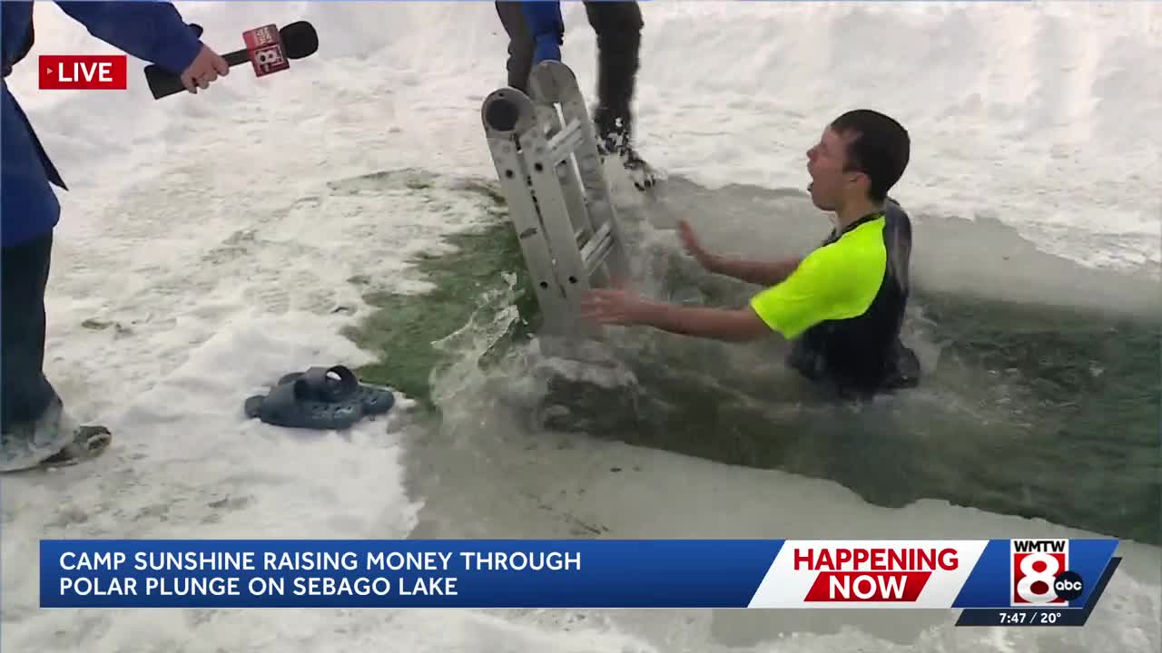 Jumping into Sebago Lake in the winter
