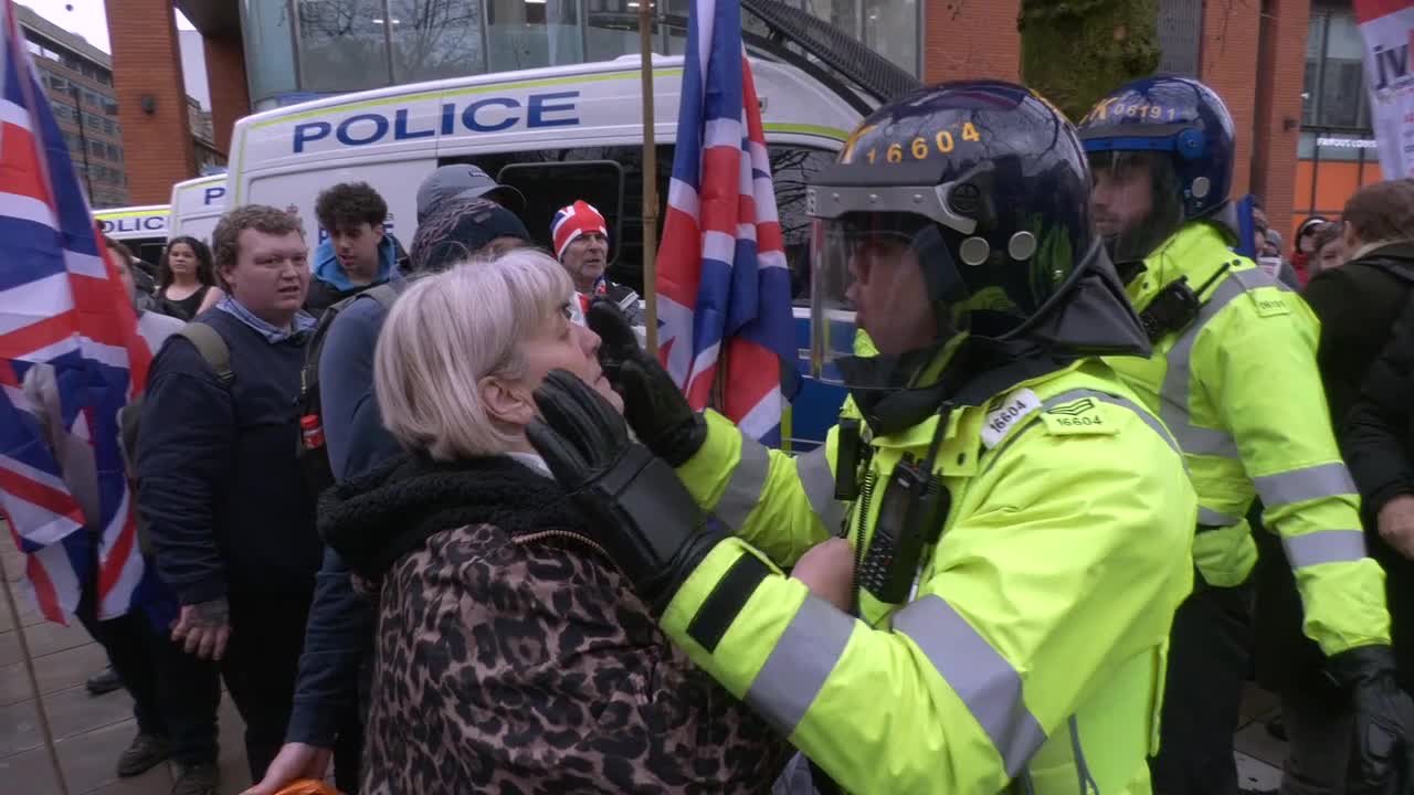 Ugly clashes in Manchester as counter-protesters scuffle with 'Britain ...