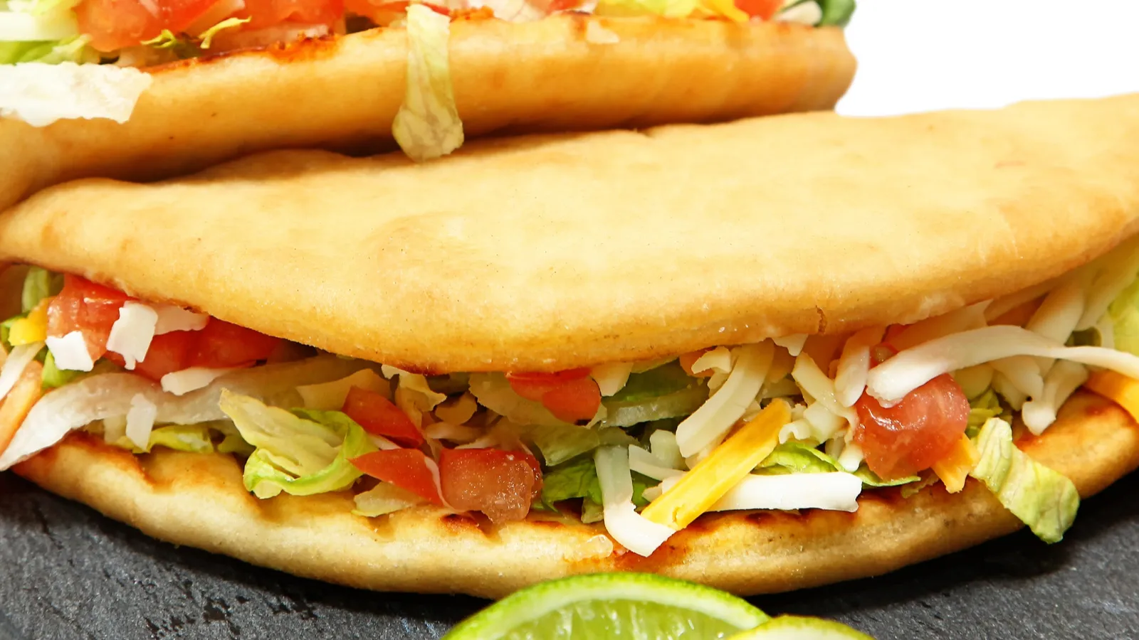 Fajitas meet chalupas and nacho fries in Taco Bell’s newest release