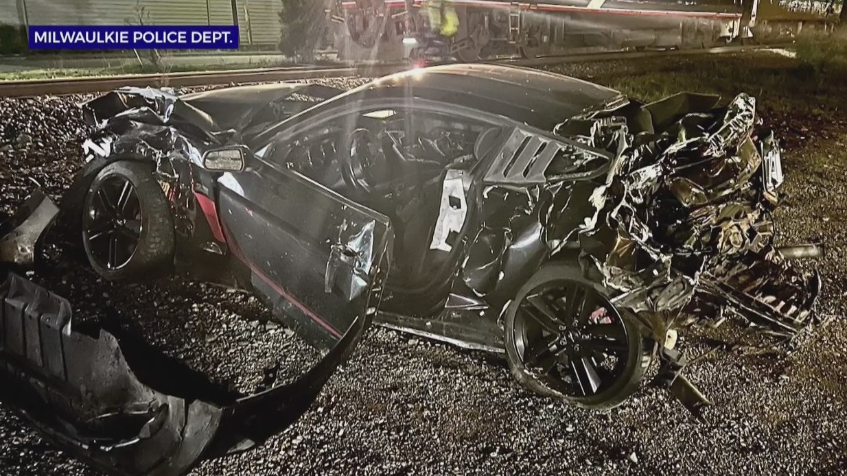 Amtrak train crashes into Mustang abandoned on Milwaukie railroad tracks