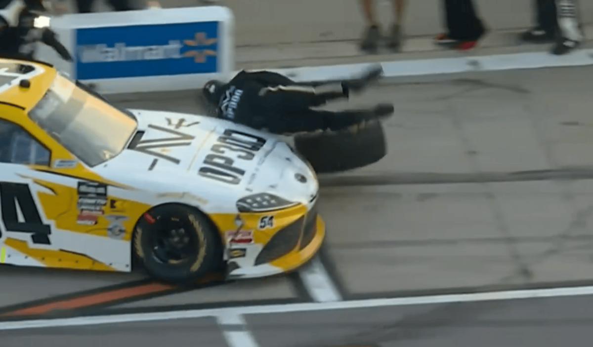 NASCAR pit crew member hit by car during race