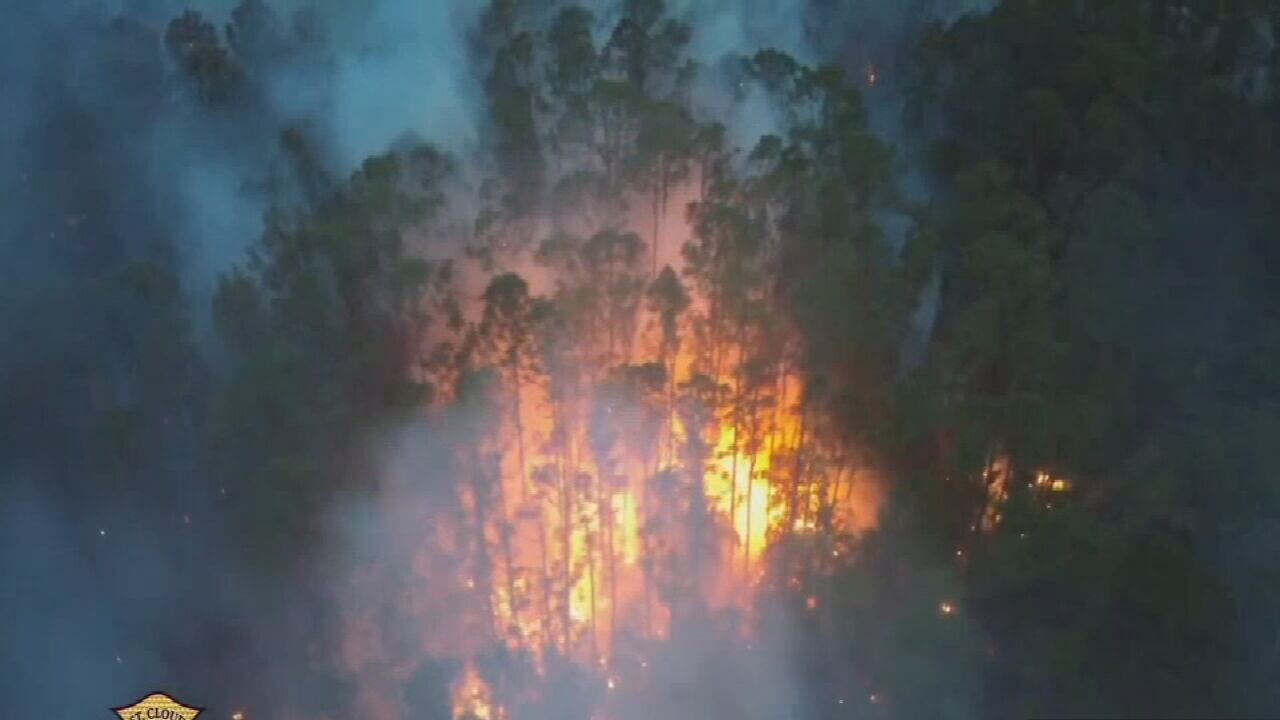 Brush fire threatens structures in Suburban Estates area of Osceola County