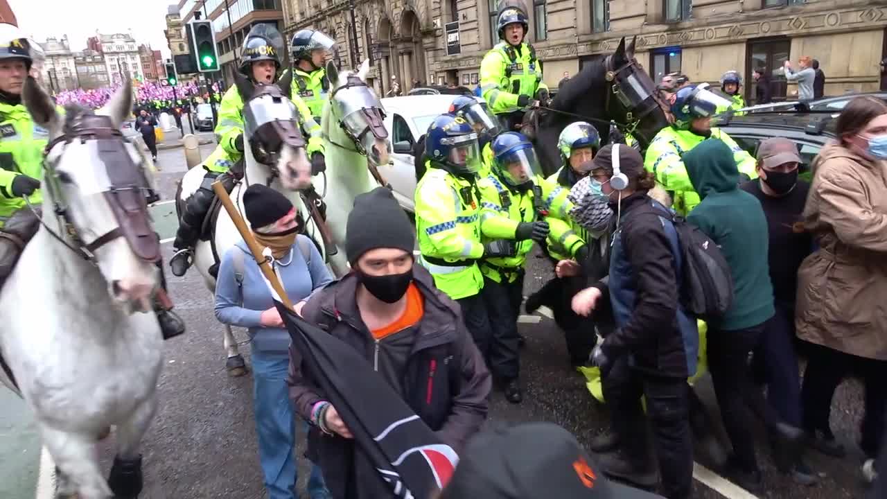 Tensions flare in Manchester: Arrests as anti-racism protesters ...