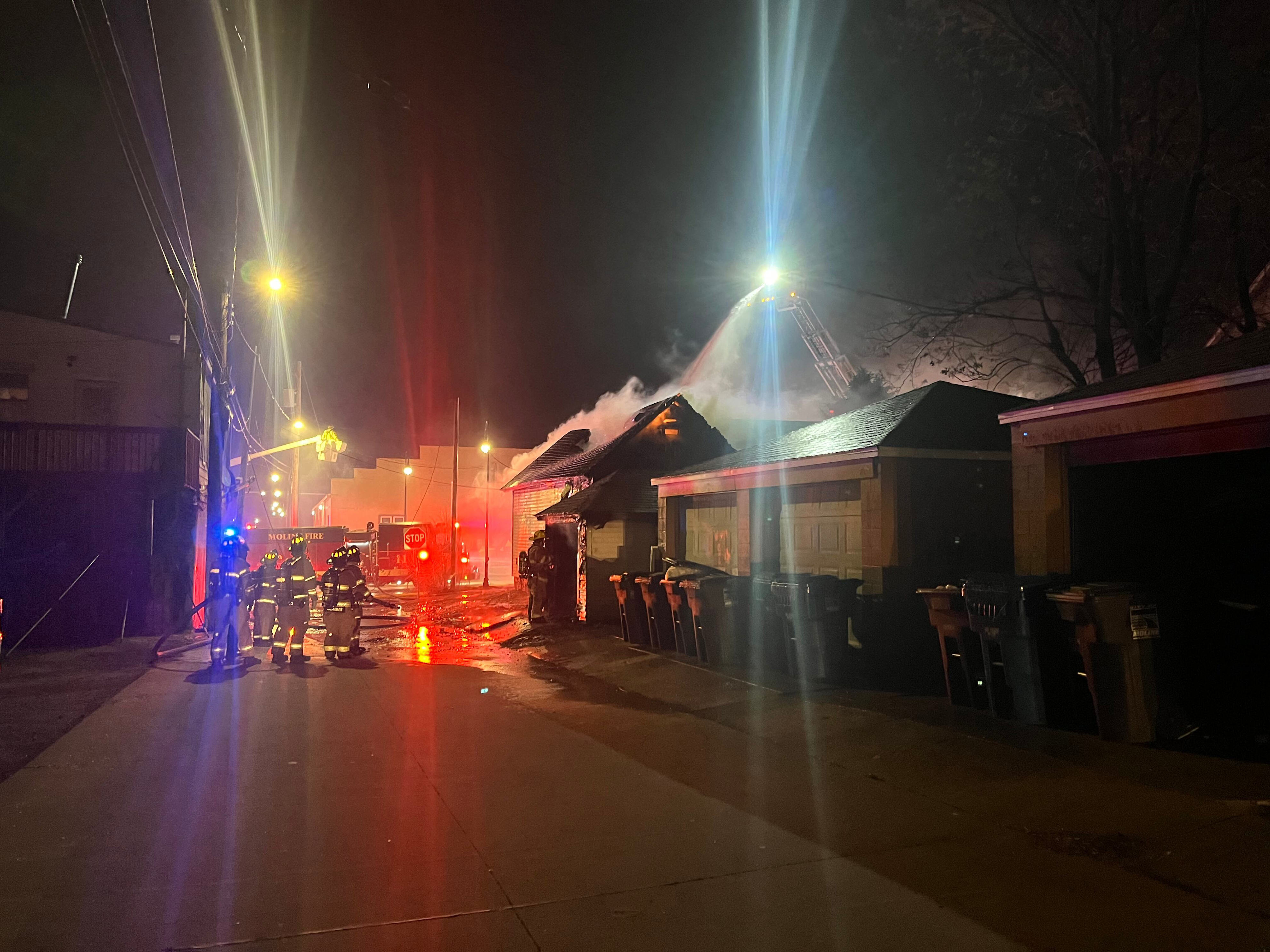1 firefighter injured after garage fire spreads to house