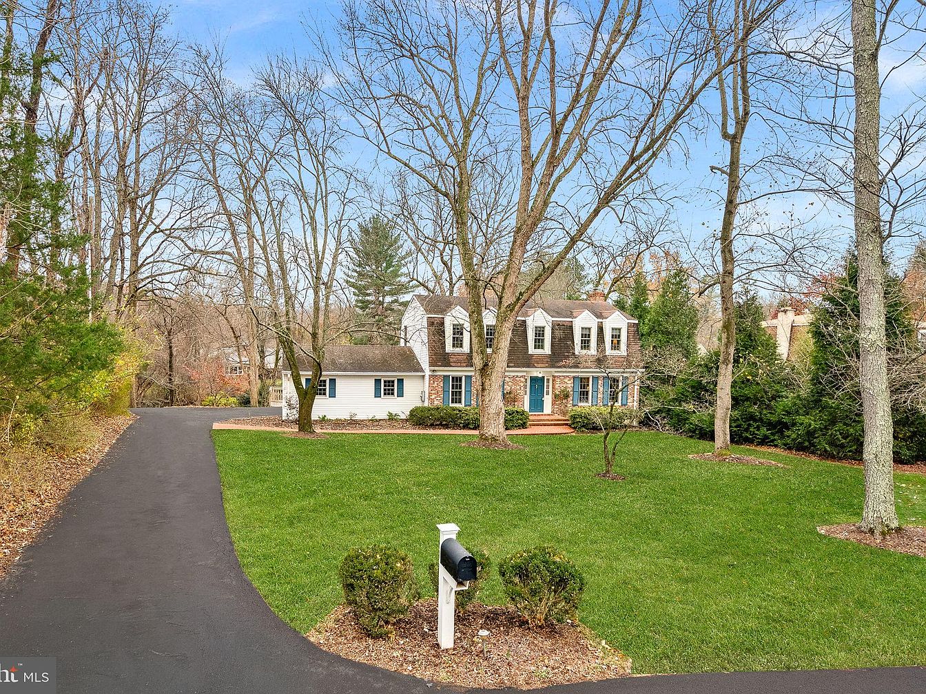 Step into a 1976 colonial gem in Great Falls, Virginia, featuring a ...