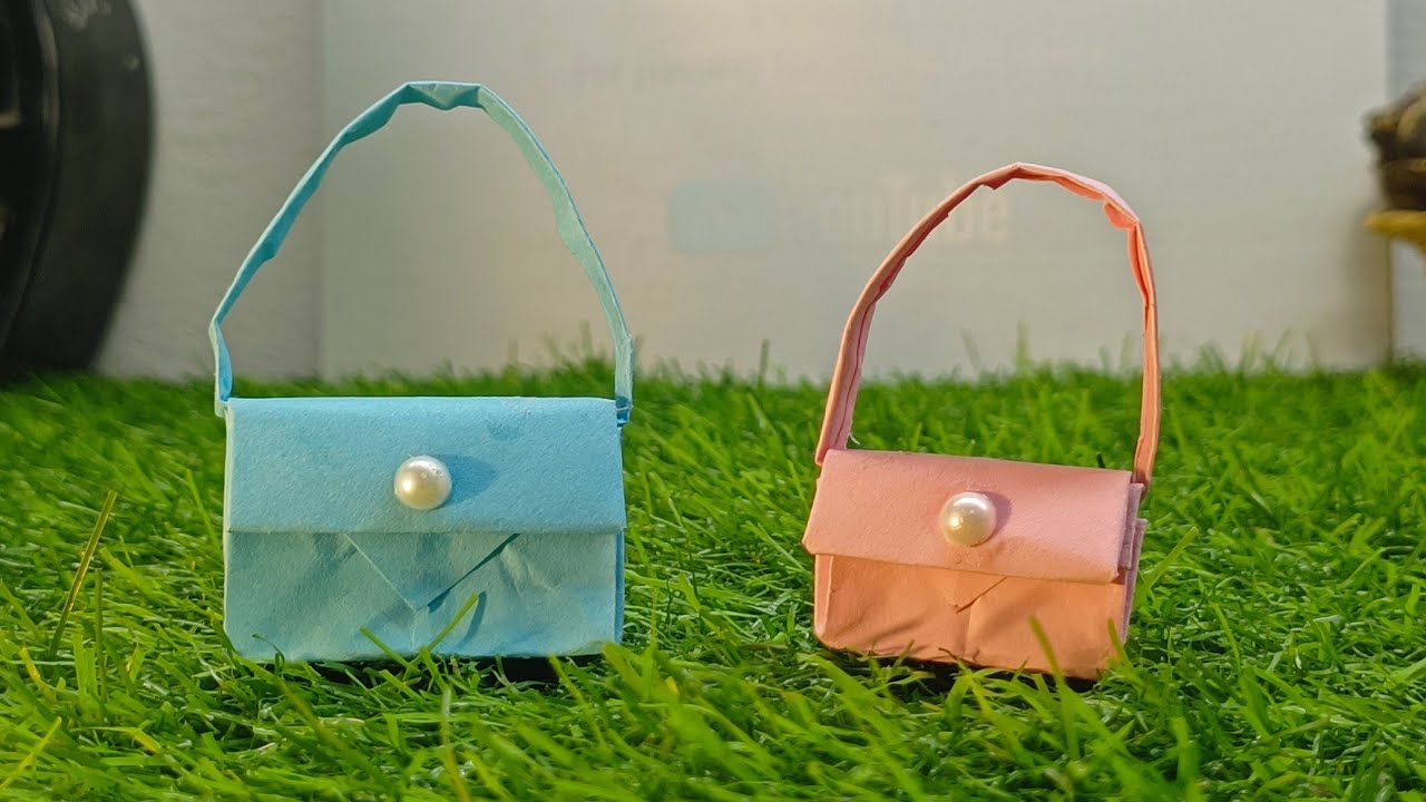 Easy origami tutorial for a decorative paper handbag