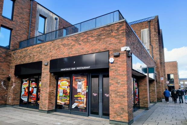 Signs go up in window of new Durham city centre bar ahead of opening