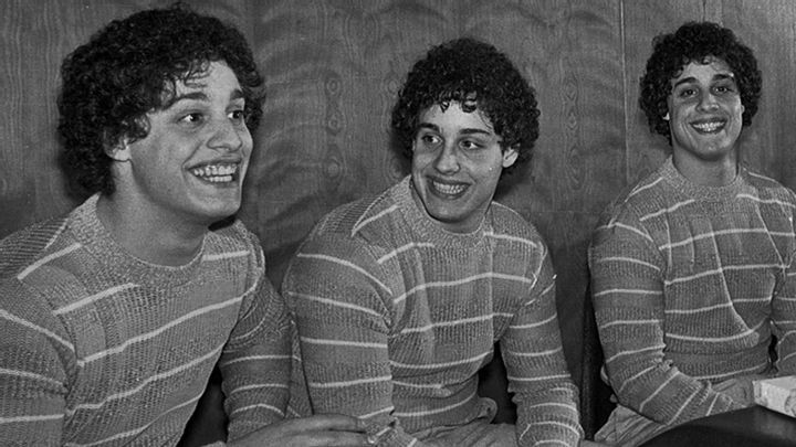 Identical strangers: How three triplets were split