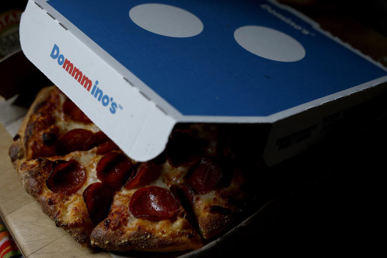 Domino’s stock slides on earnings miss. It’s counting on more stores to ...