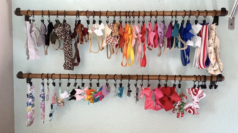 Keep hair bows and accessories organized with a curtain ring DIY
