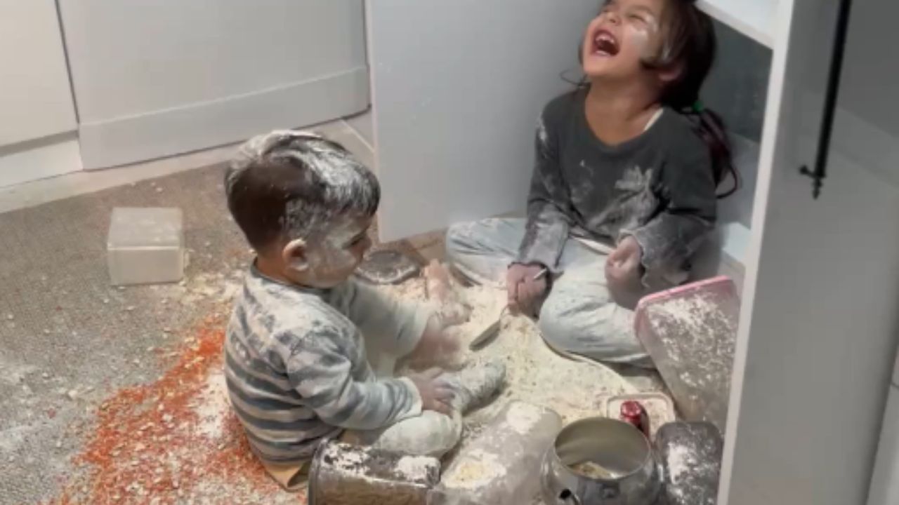 Siblings boast their mischievous sides by creating a huge mess in kitchen