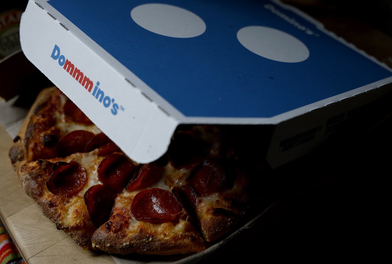 Domino’s stock slides on earnings miss. It’s counting on more stores to ...