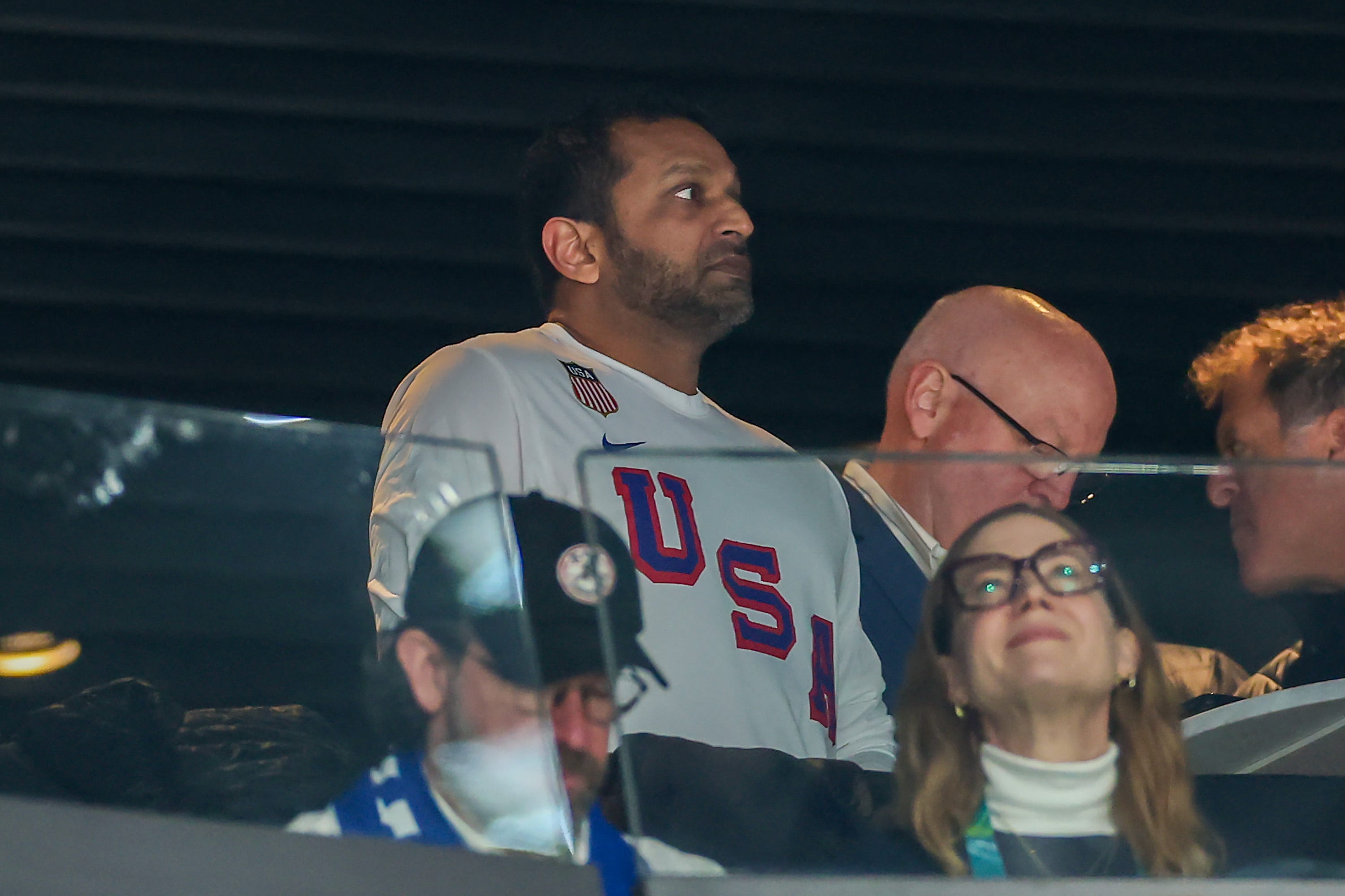 FBI Director Kash Patel celebrates with USA hockey team after win