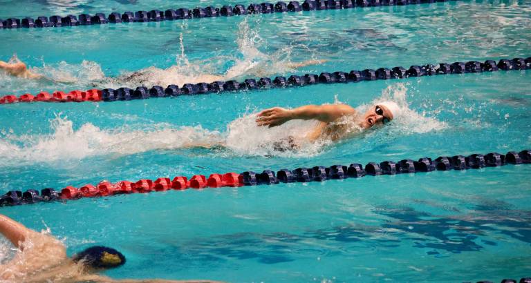 Islanders Dunn and Carson capture state titles at swim and dive meet