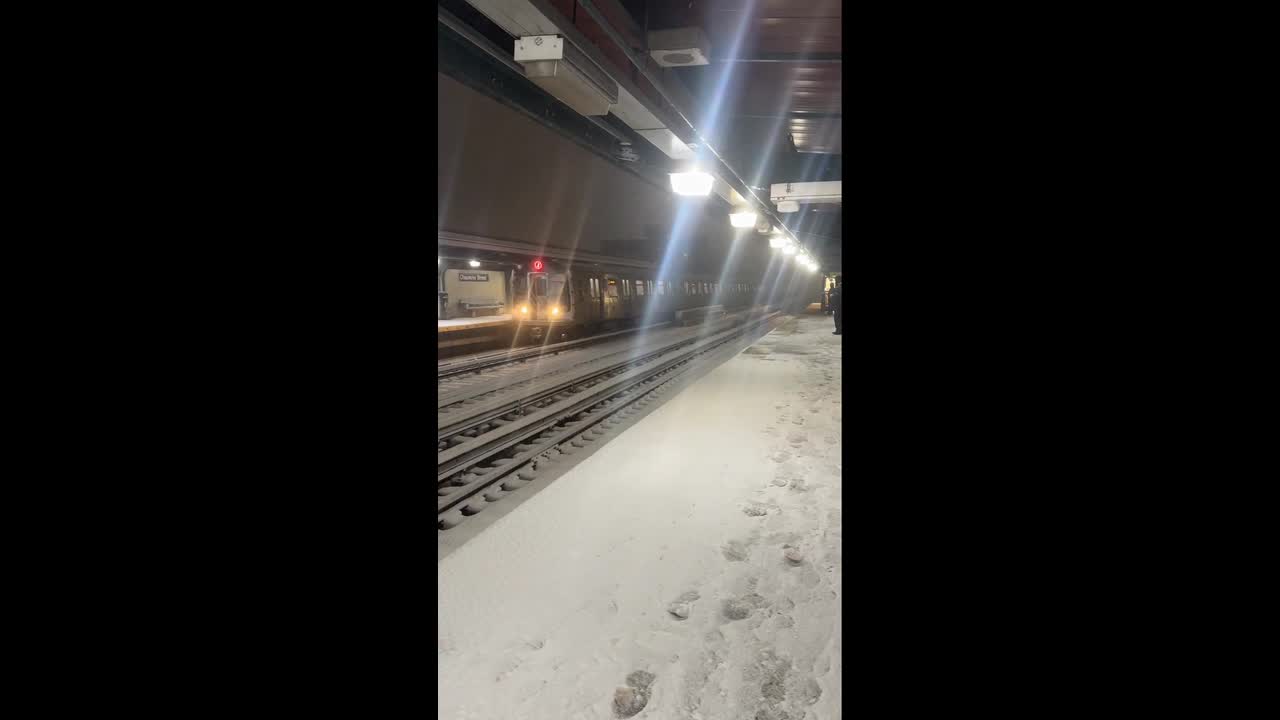 Blizzard sends sparks flying on New York City subway