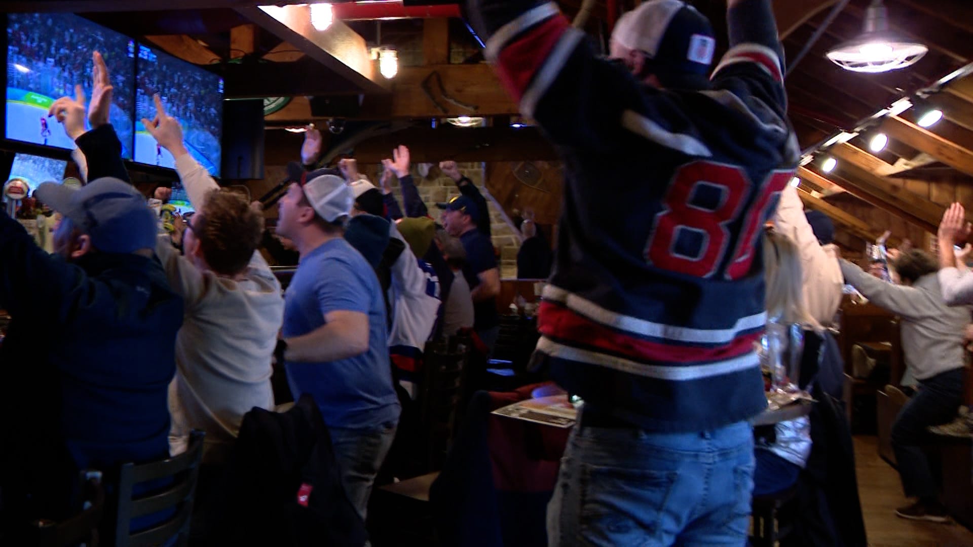 Hockey fans at Primanti Bros. in Pennsylvania celebrate US gold medal win