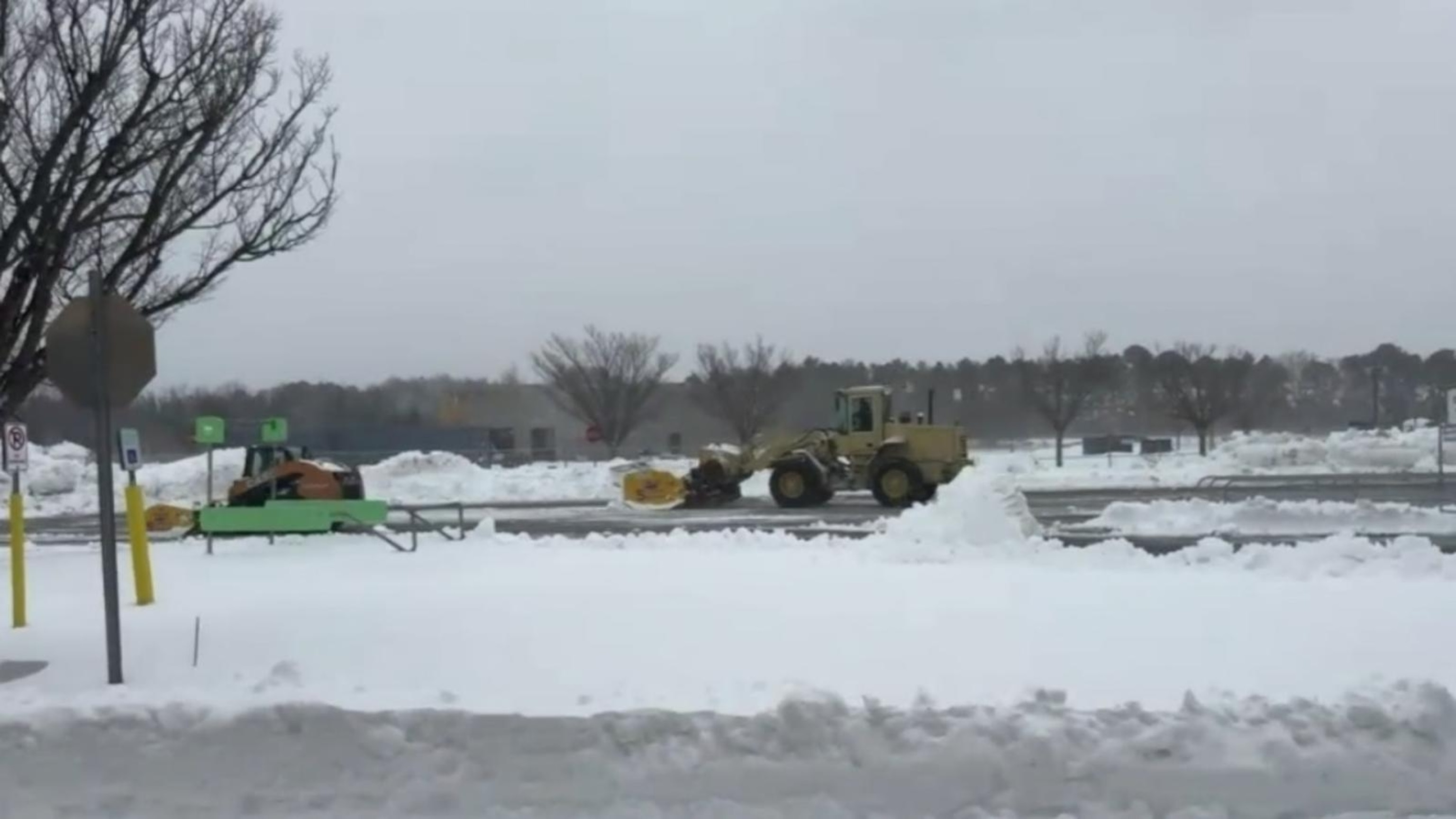 Behind the wheel of a snow plow in New York