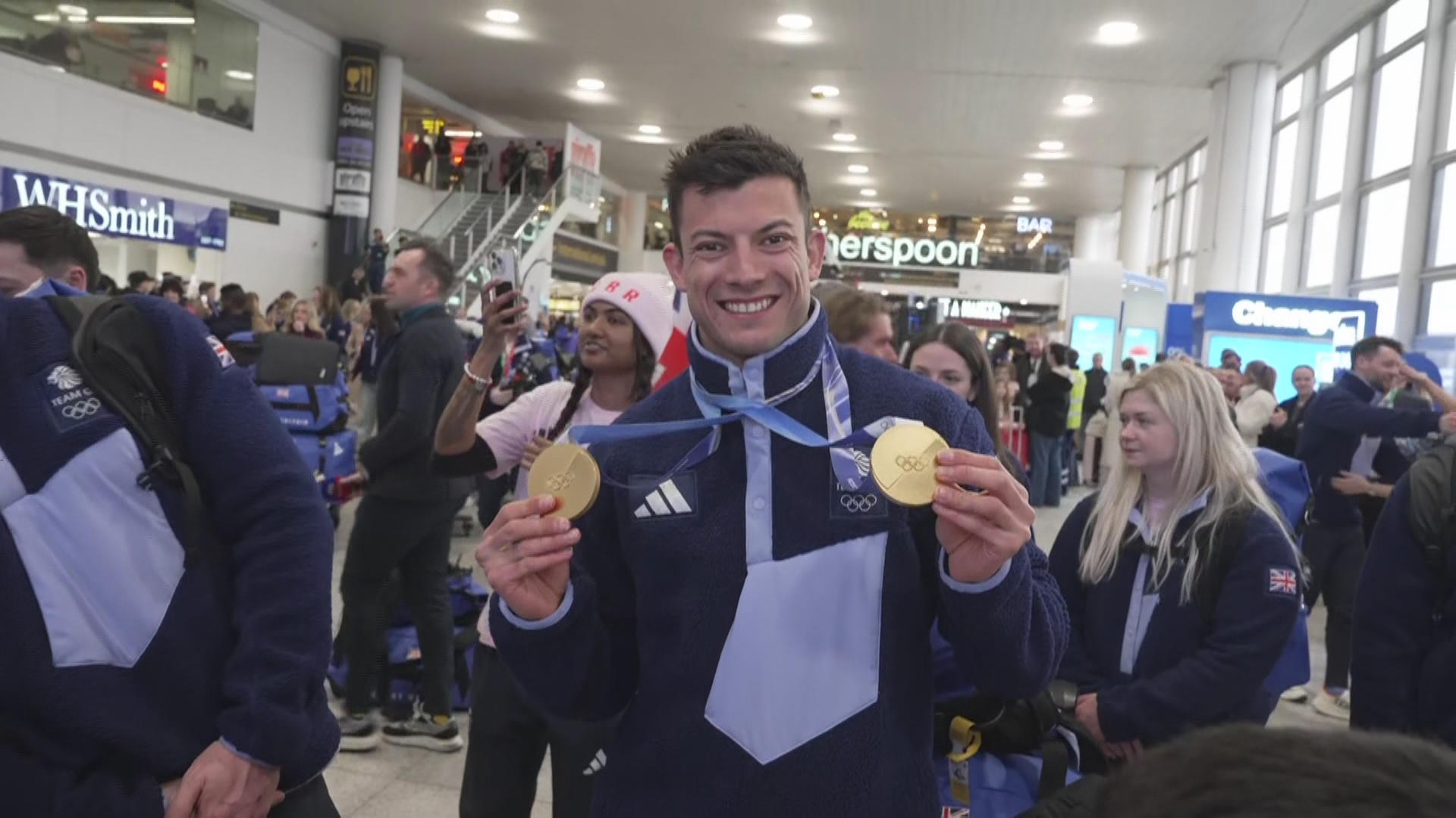 Warm welcome for Team GB Winter Olympics return