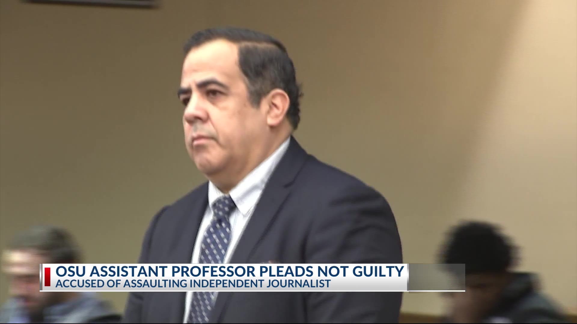 Ohio State assistant professor pleads not guilty to assault