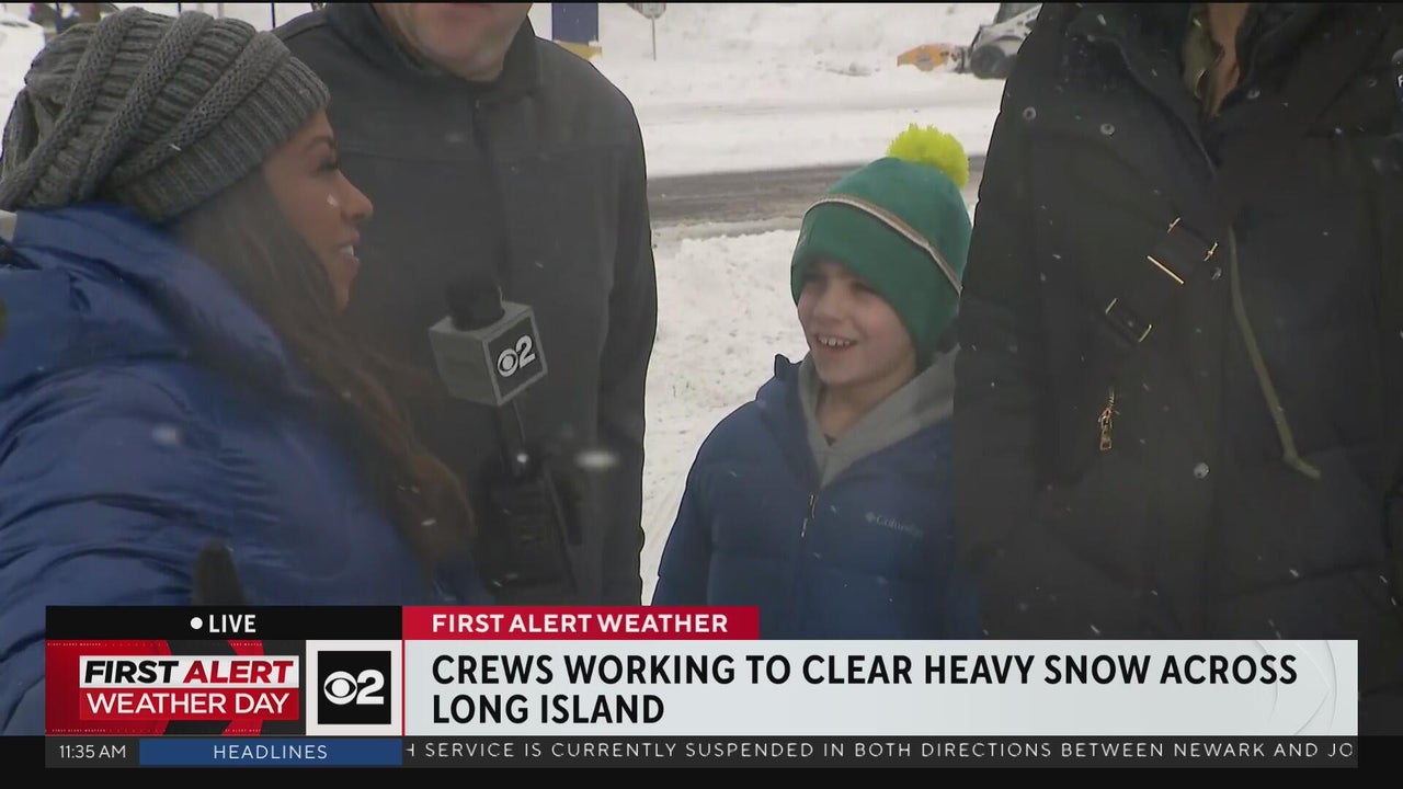 Young man on Long Island wishes happy snow day to all