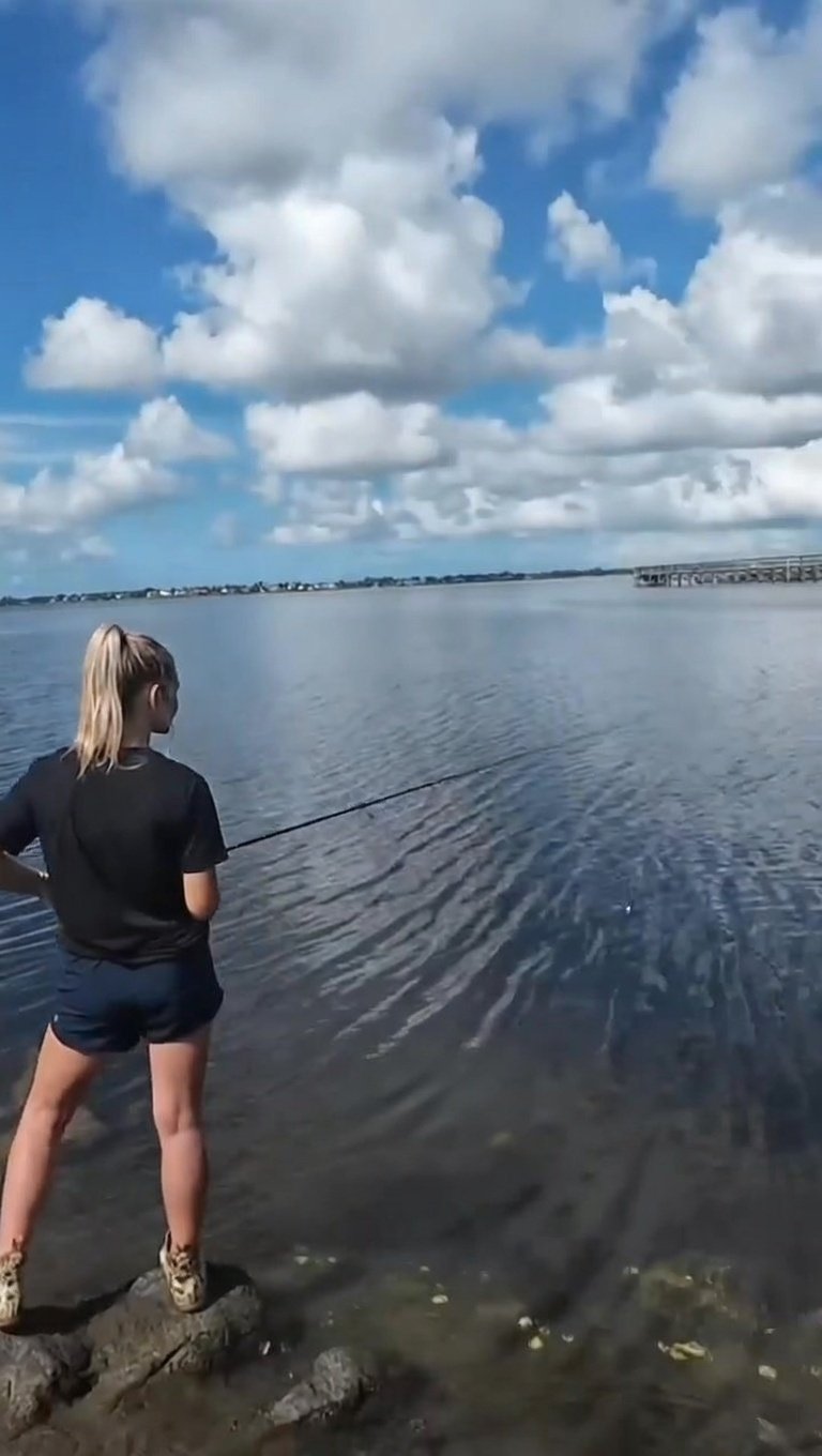Fishing by the dam