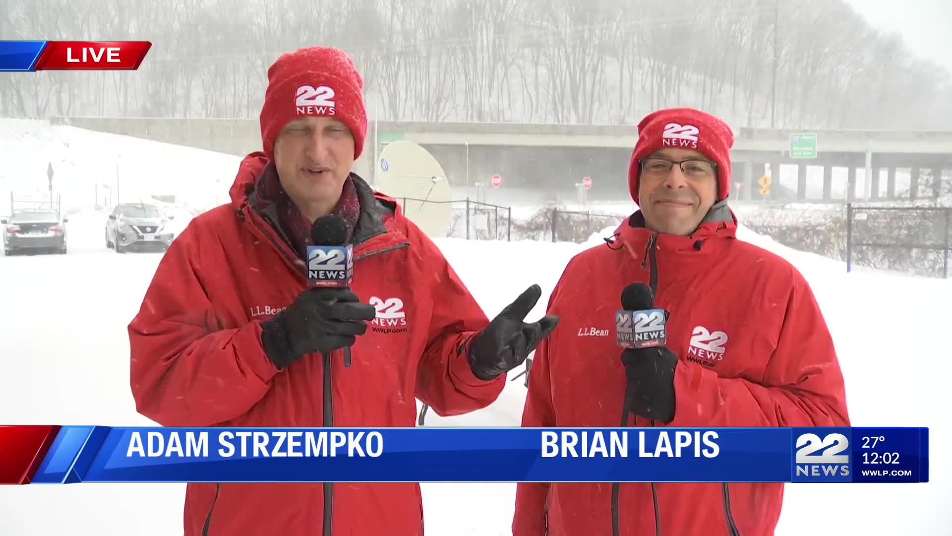 Snow has lightened in intensity, strong gusts continue