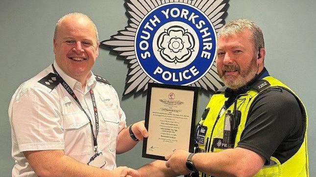 Officers who saved bus driver's life commended