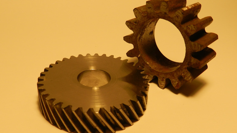 If straight cut gears are so great, why don't street cars use them?