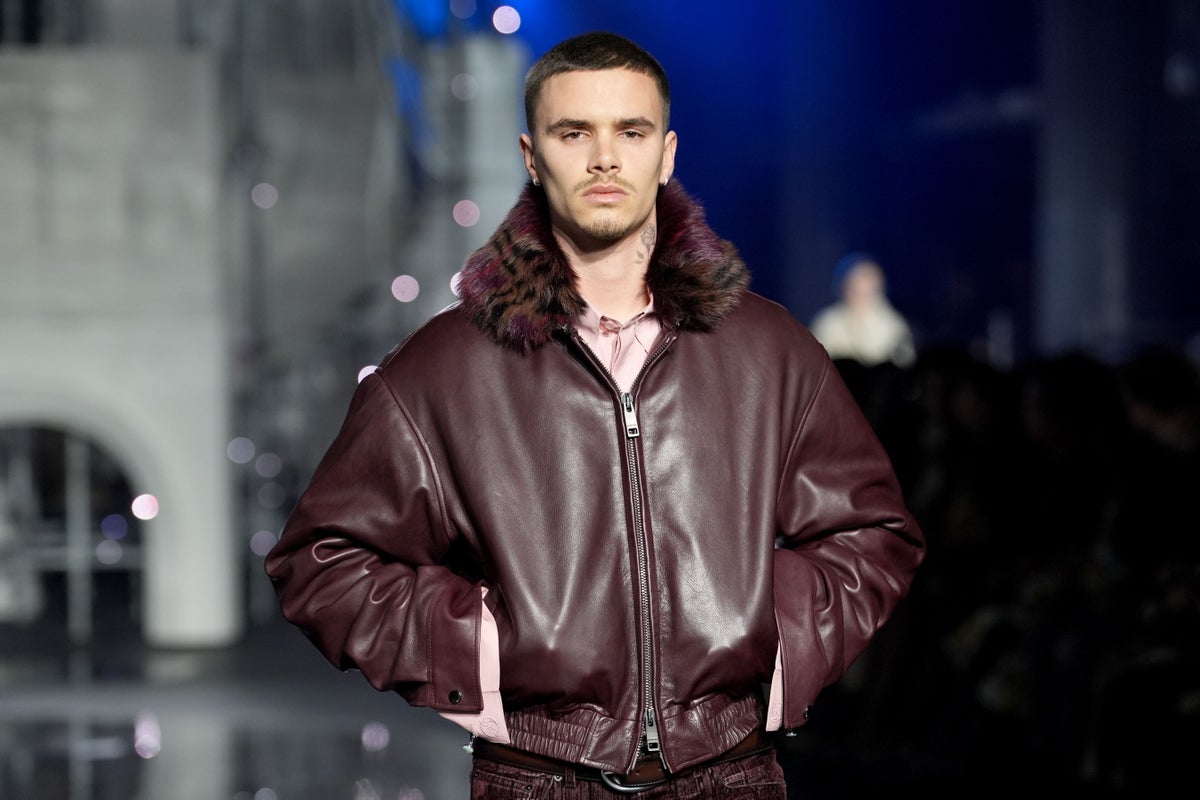 Romeo Beckham and Rosie Huntington-Whiteley walk in Burberry to close ...